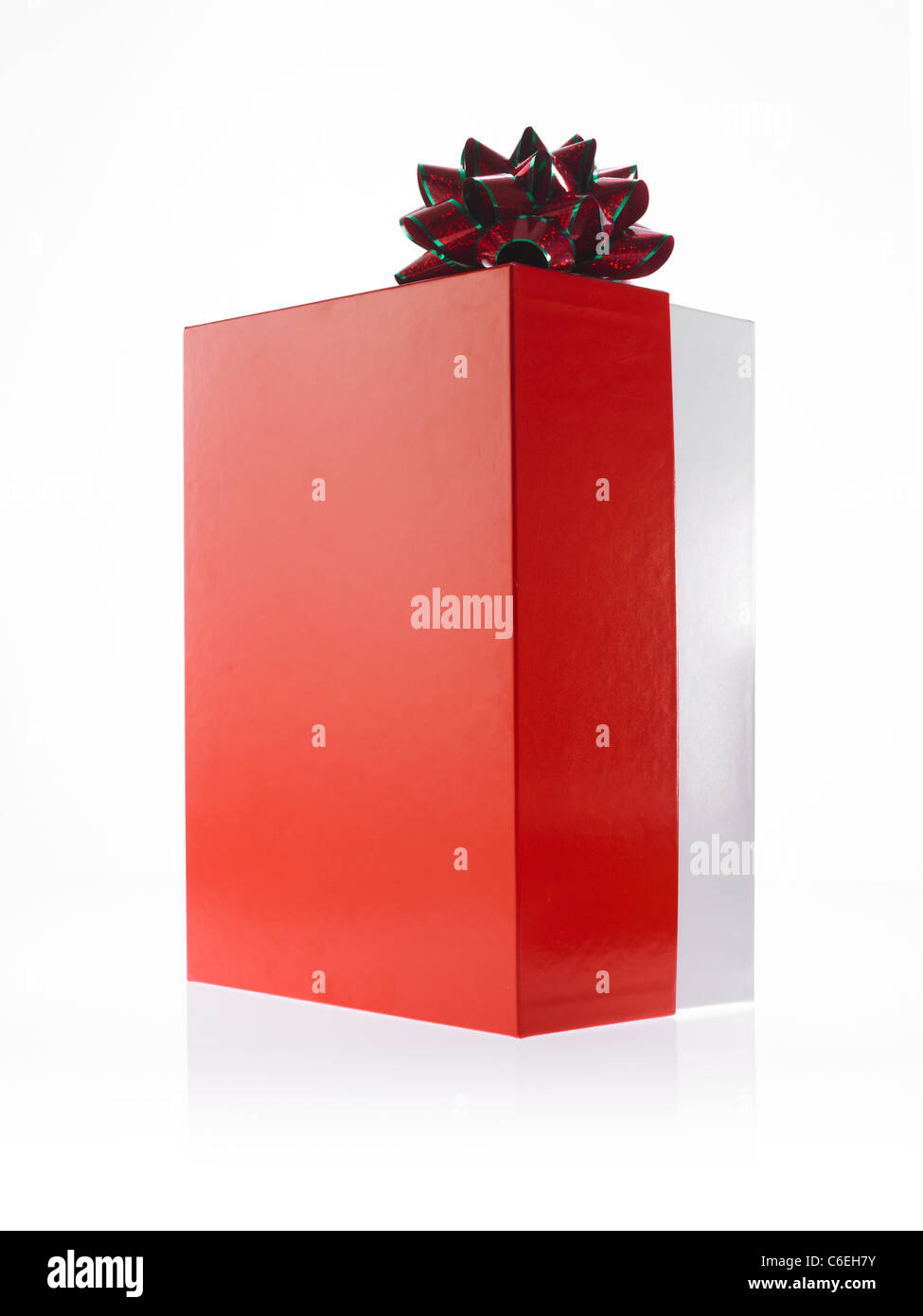 Studio shot of Red and Green Ribbon and Red Box on white background ...