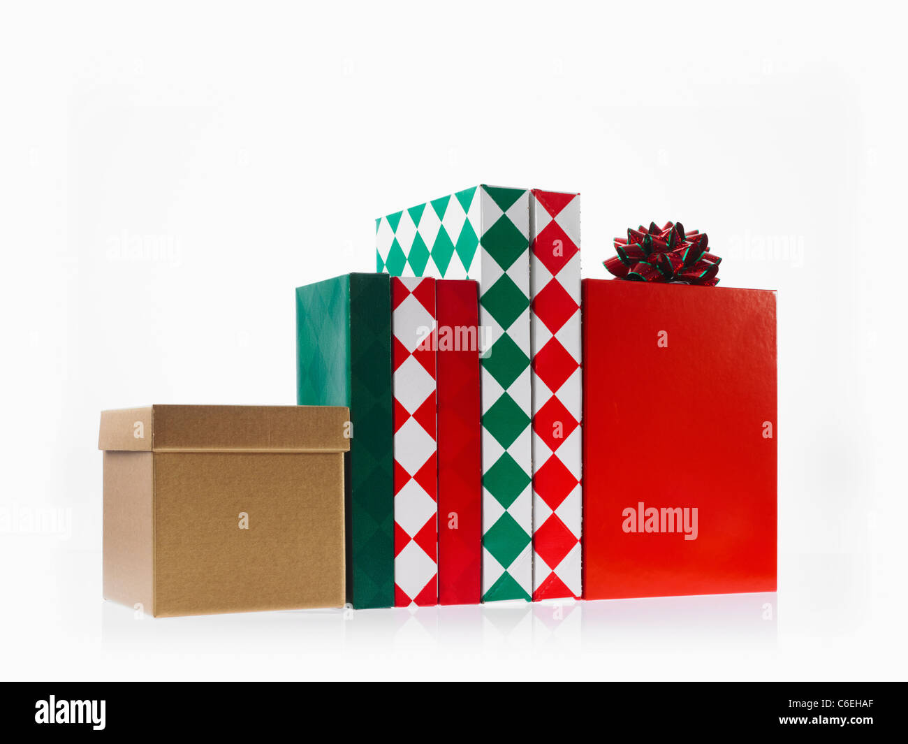 Four boxes with ribbon, studio shot Stock Photo - Alamy