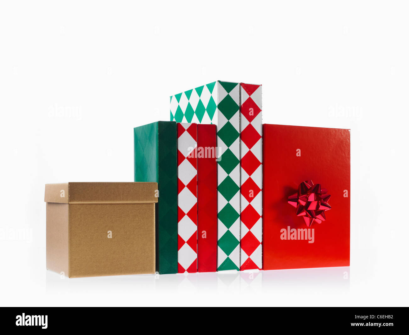 Four boxes with ribbon, studio shot Stock Photo - Alamy