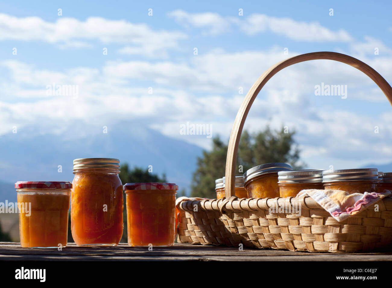 USA, Colorado, Carbondale, Basket full of jars with preserves Stock ...