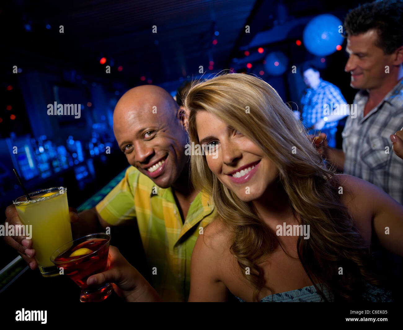 USA, Arizona, Scottsdale, Friends enjoying drinks at bar Stock Photo ...