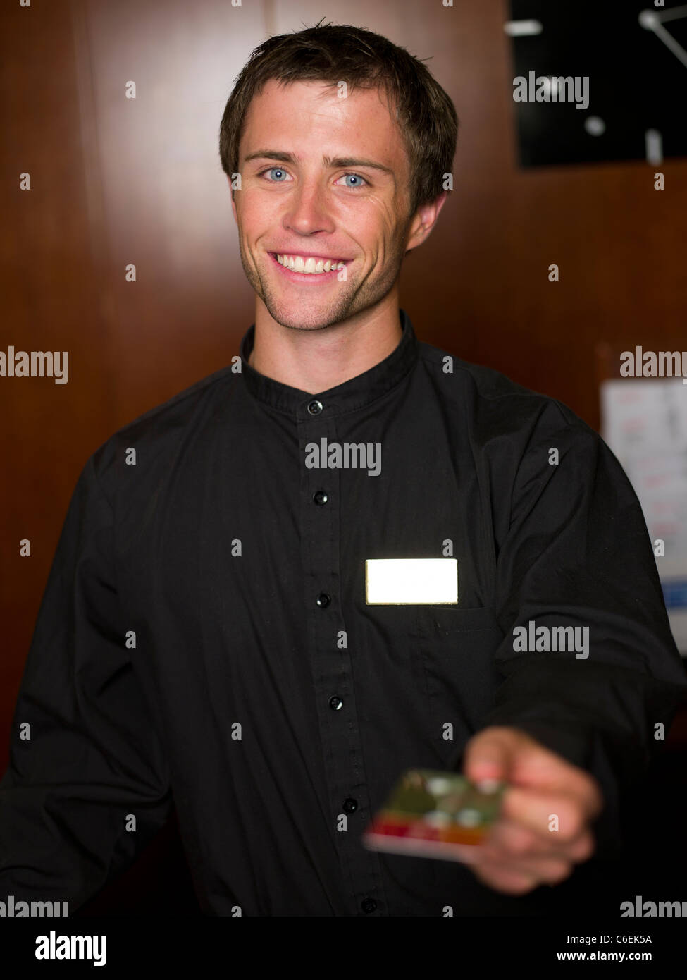 Receptionist man hotel hi-res stock photography and images - Alamy