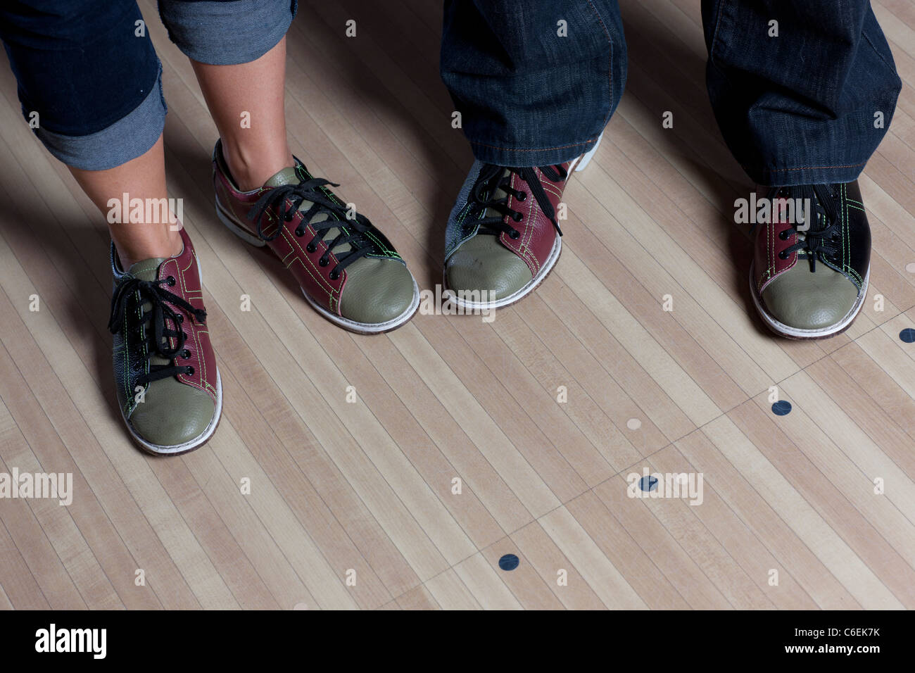 USA, Arizona, Scottsdale, Close-up of legs in bowling shoes at bowling ...