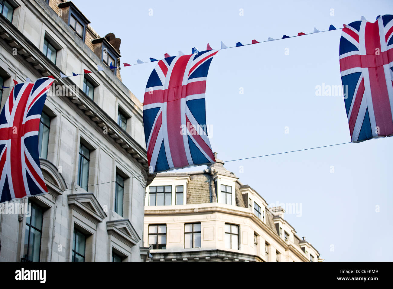 Union jack flags hanging on Regent Street, London Stock Photo - Alamy