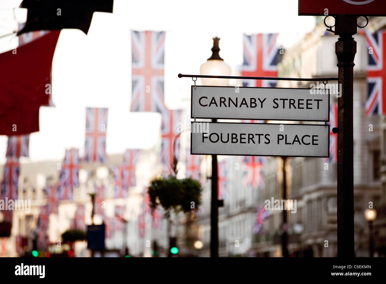 Union jack flags hanging on Regent Street, London Stock Photo - Alamy