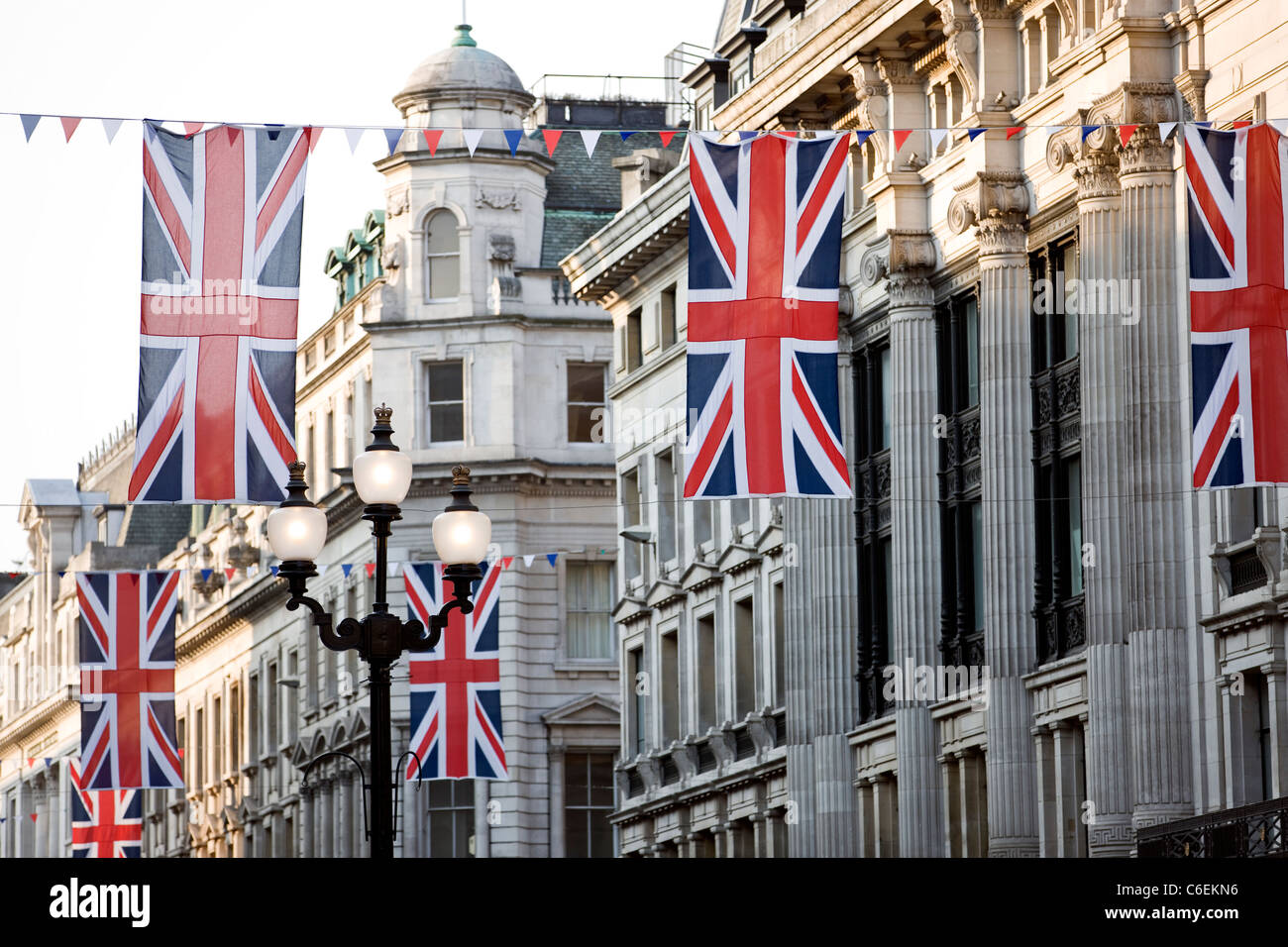Union jack flags hanging on Regent Street, London Stock Photo - Alamy