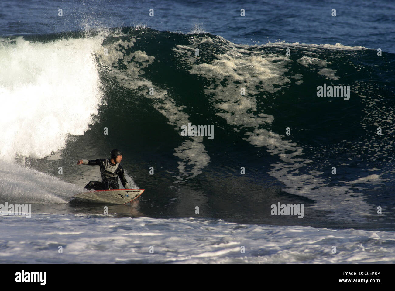 Surfing a big winter wave. Buchupureo, Biobio, Chile, South America ...