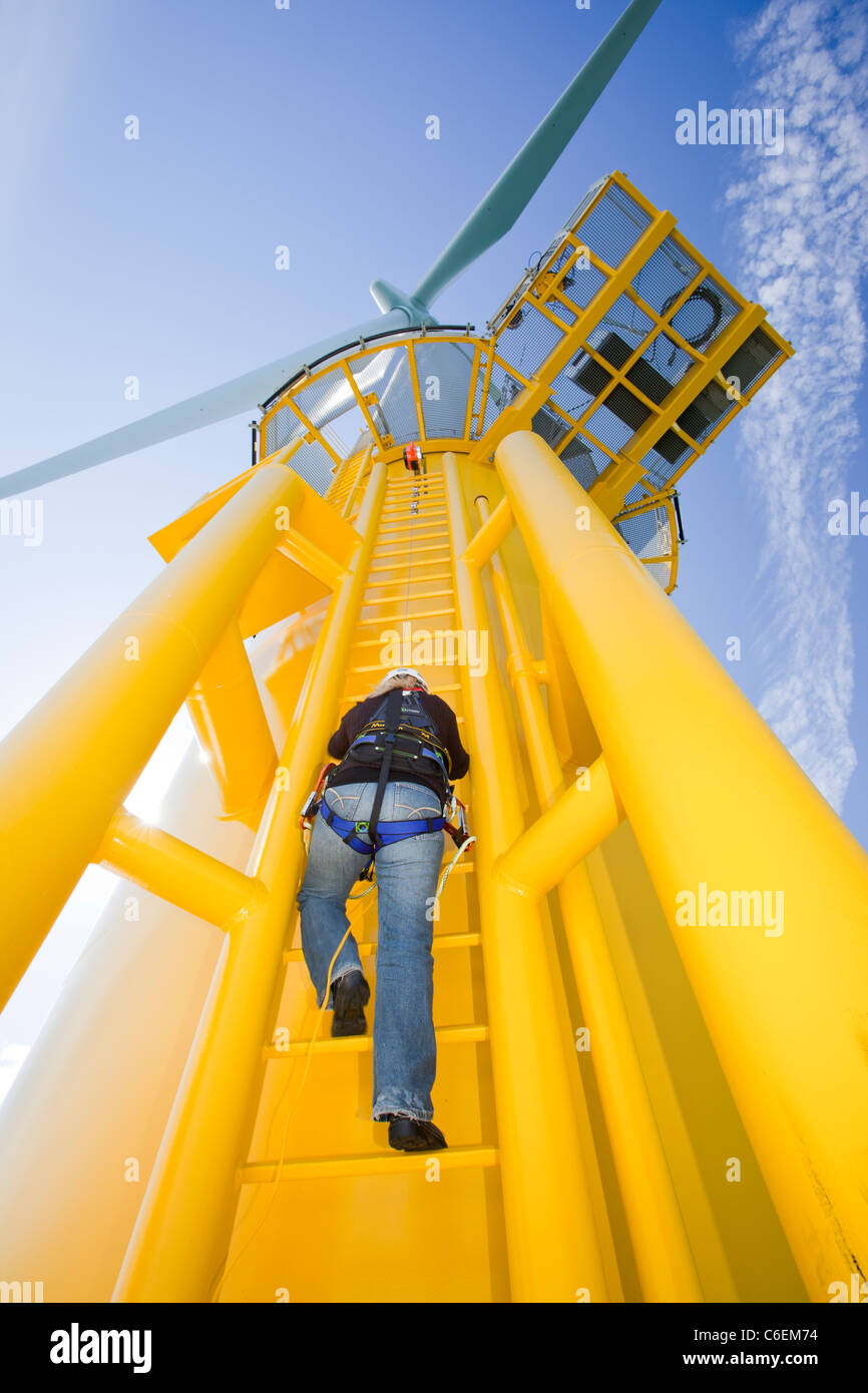 Engineer climbing wind turbine hi-res stock photography and images - Alamy