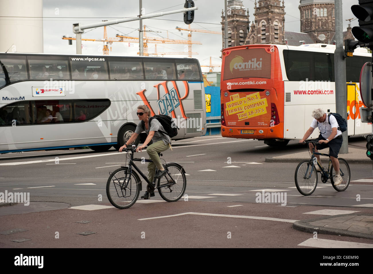 Cyclists and Buses Amsterdam Holland Netherlands Europe Stock Photo - Alamy