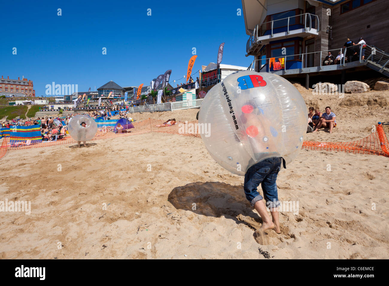 Beach sumo bodyzorbing Fistral beach newquay Cornwall England UK GB EU ...