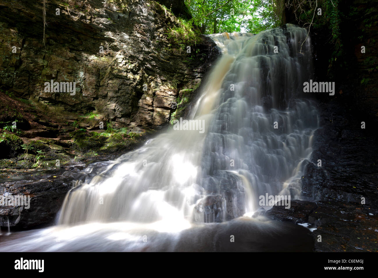 Gushing water over Hareshaw Linn Waterfall, near Bellingham ...