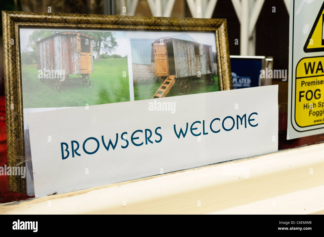 Sign in a shop window informing shoppers that browsers are welcome ...