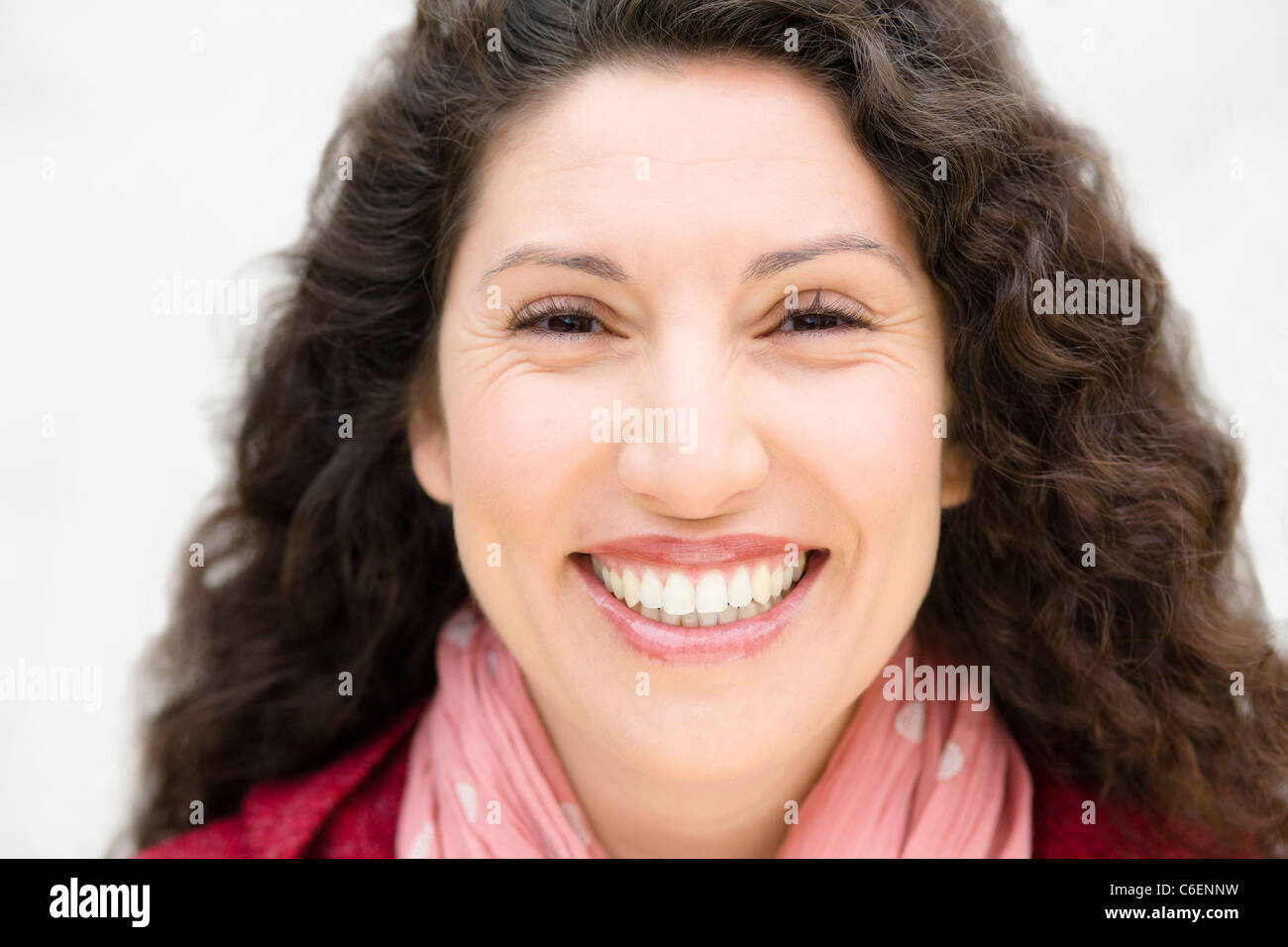 Smiling Hispanic woman Stock Photo - Alamy