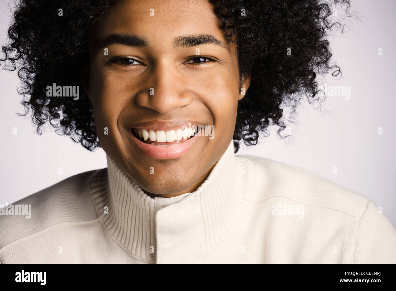 Smiling mixed race man Stock Photo - Alamy