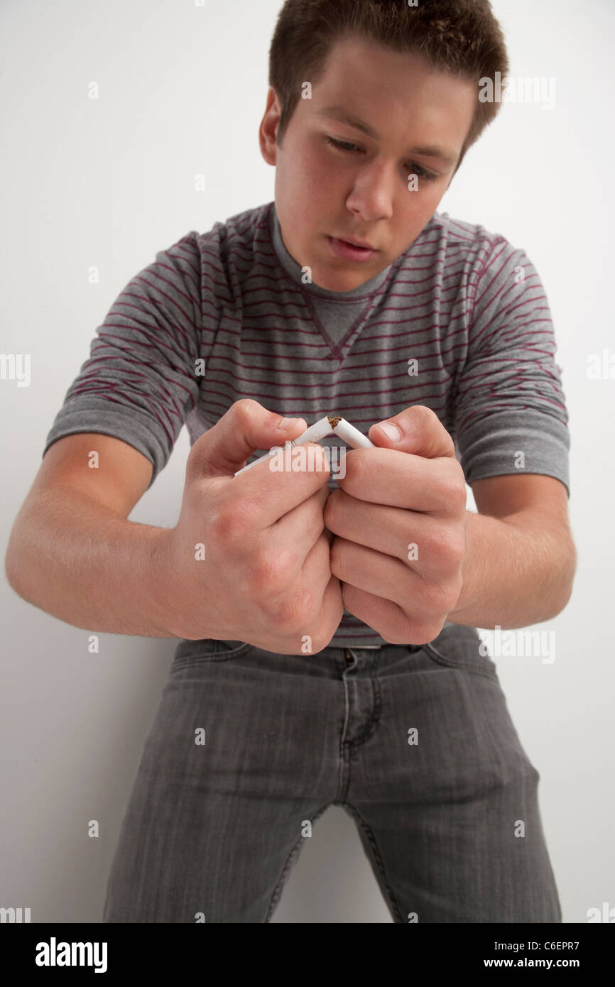 Boy with cigarette hi-res stock photography and images - Alamy