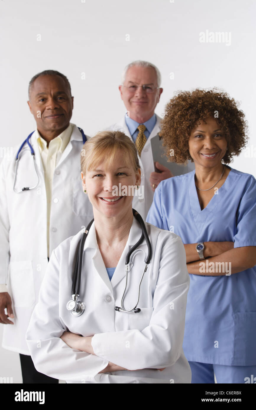 Portrait of four medical professionals, studio shot Stock Photo - Alamy