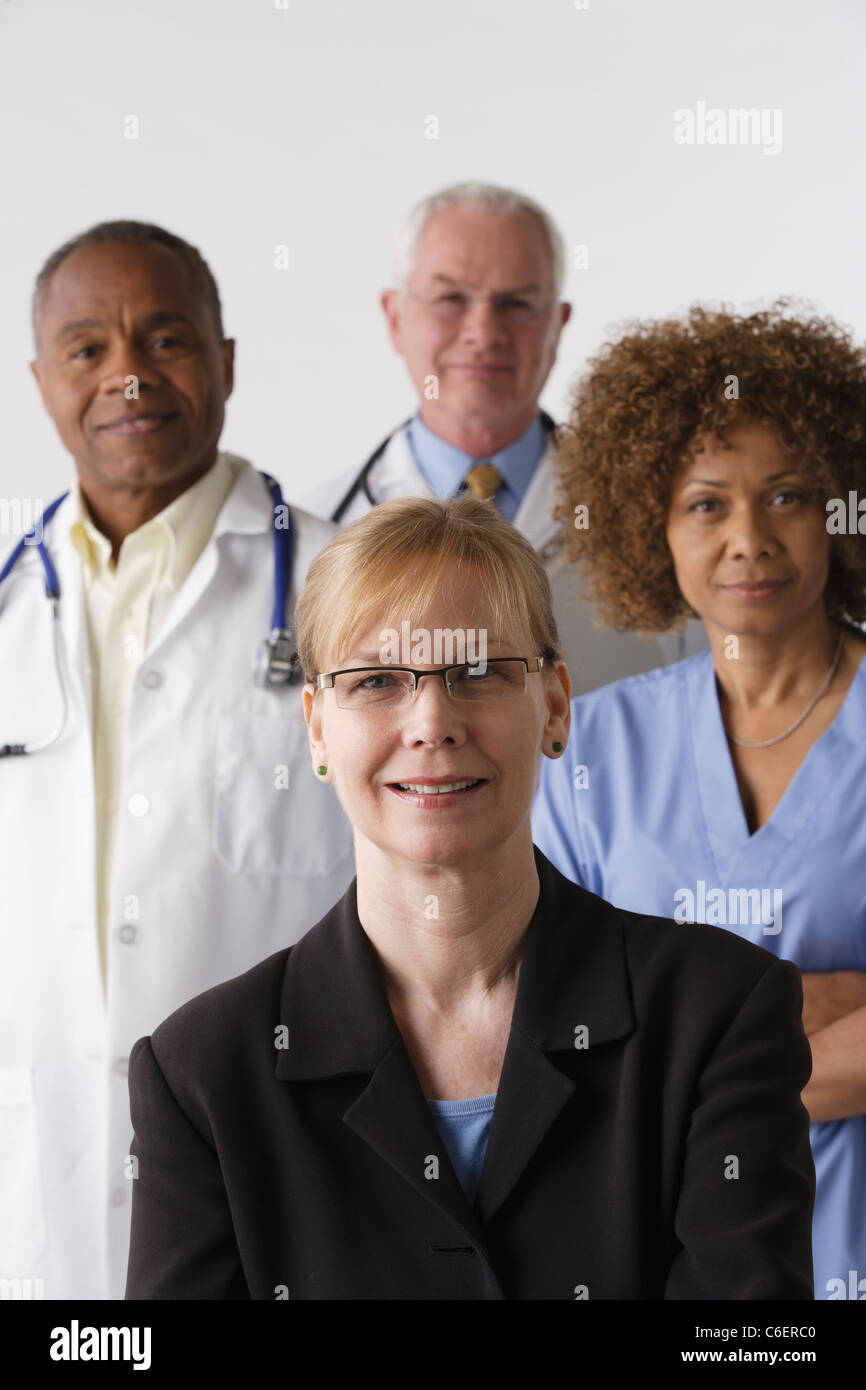 Portrait of four medical professionals, studio shot Stock Photo - Alamy