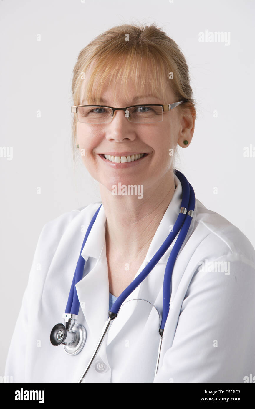 Portrait of female doctor, studio shot Stock Photo - Alamy