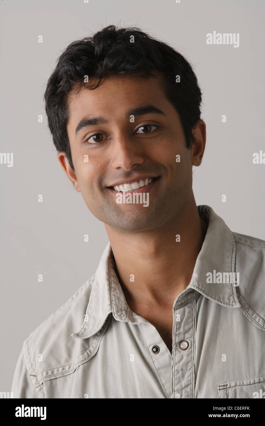 Portrait of young man, studio shot Stock Photo - Alamy