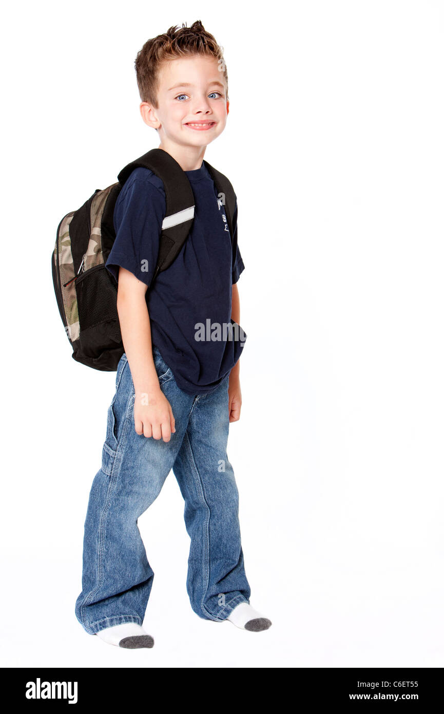 Young boy with backpack isolated on white background Stock Photo - Alamy