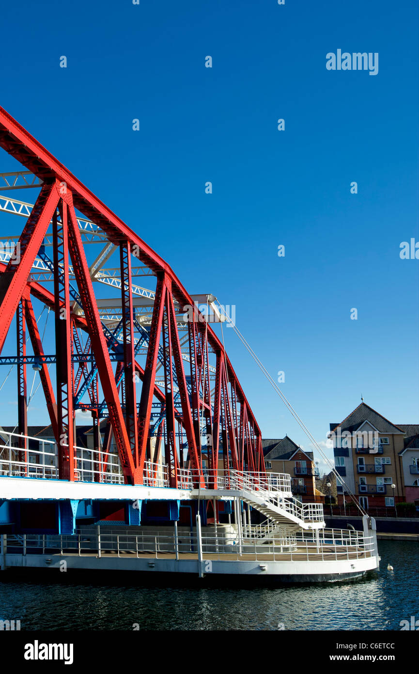 Red, white and blue bridge spanning Huron Basin in Salford Quays near ...