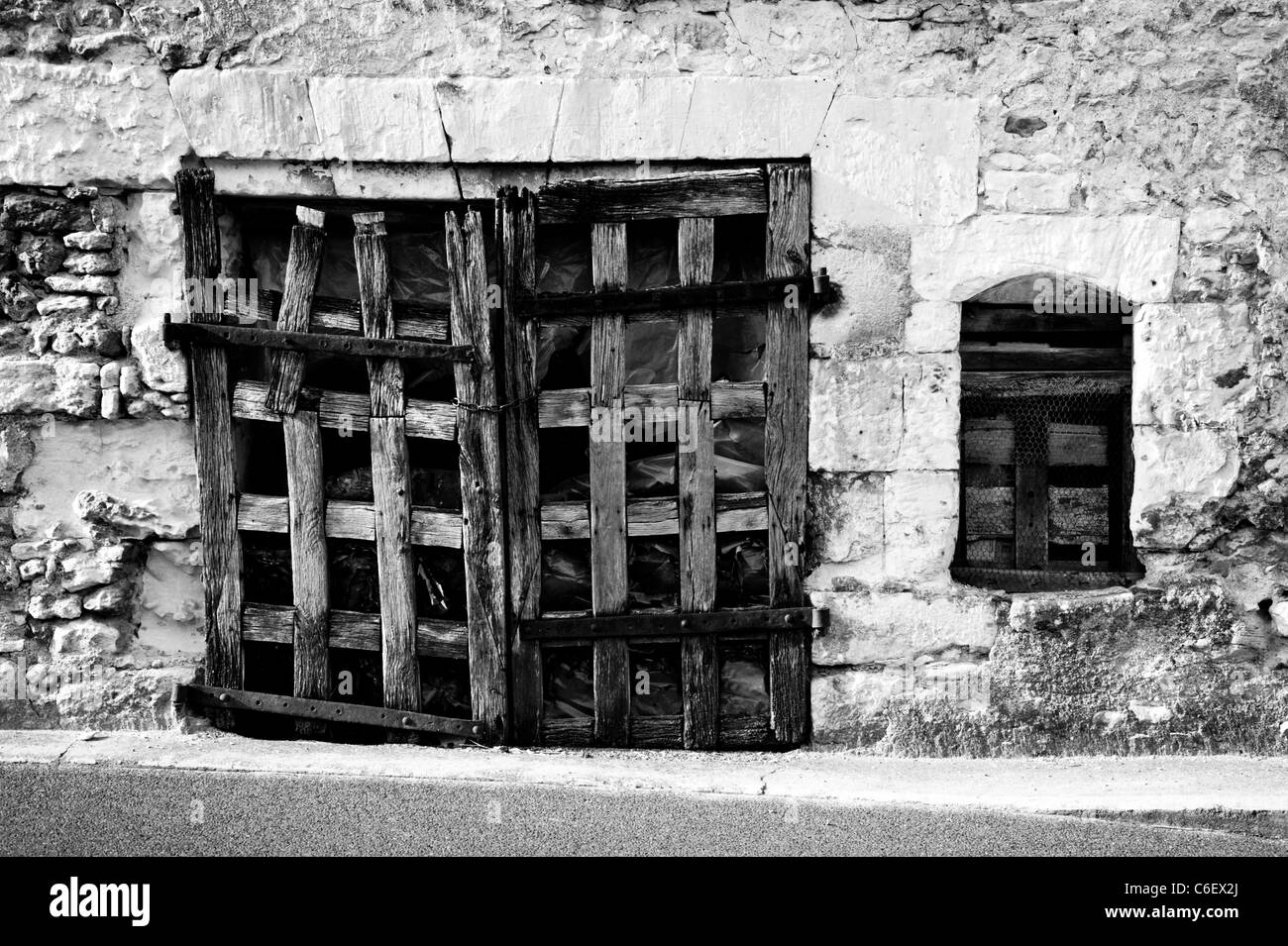 Old rustic French door and window in monochrome Stock Photo - Alamy