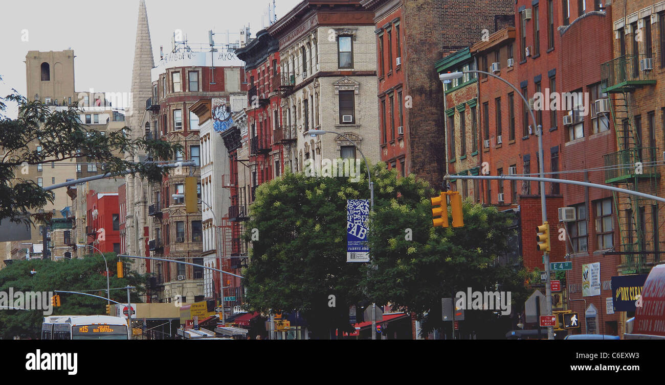 Busy neighborhood with trees brick buildings hi-res stock photography ...