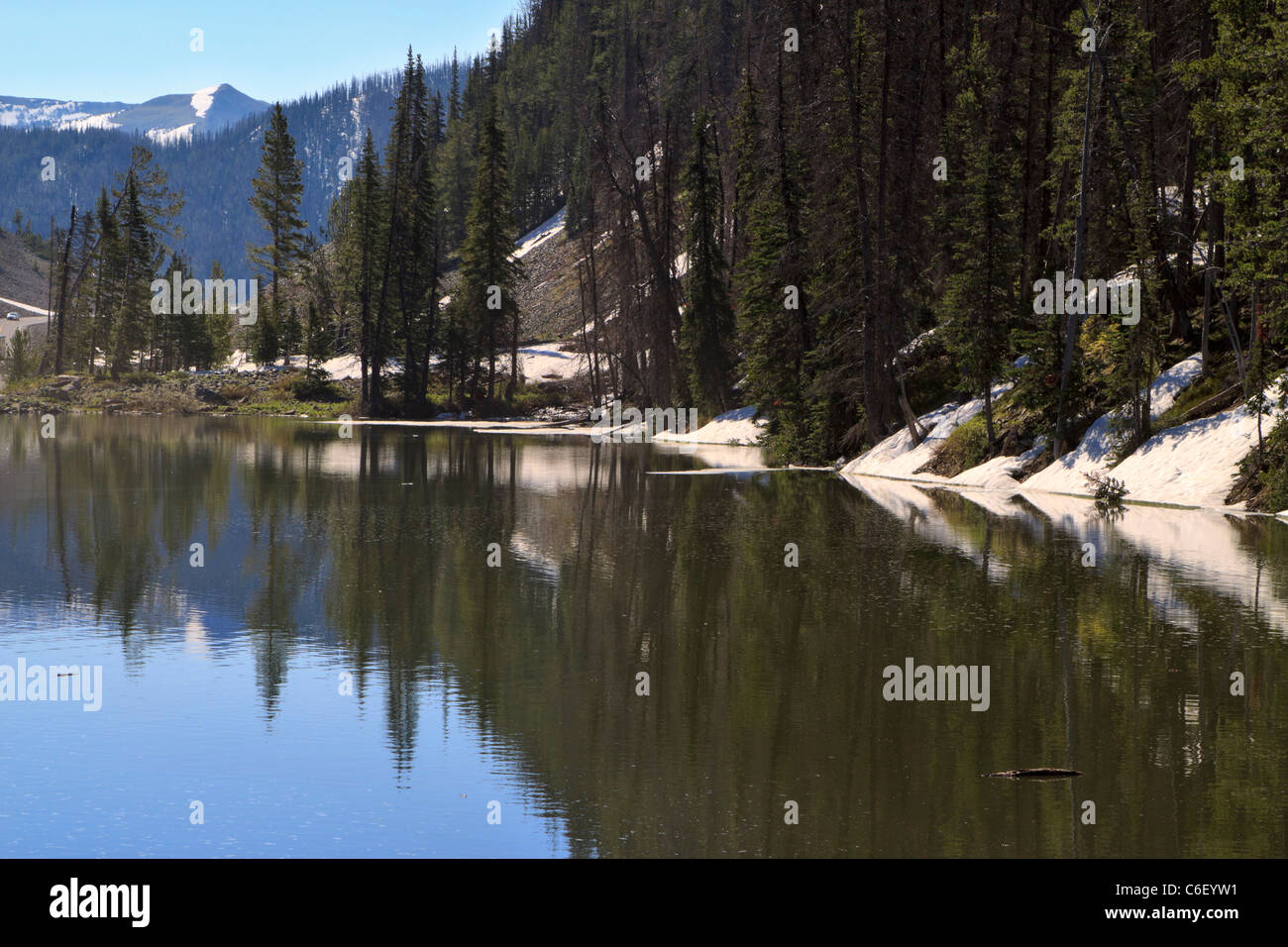 Eleanor Lake, Yellowstone National Park, Wyoming. Snow still covers ...