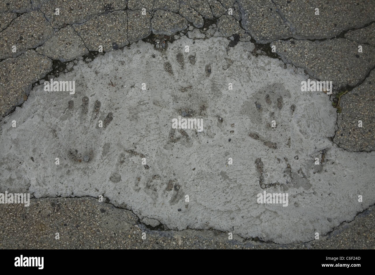 Cement handprints hi-res stock photography and images - Alamy