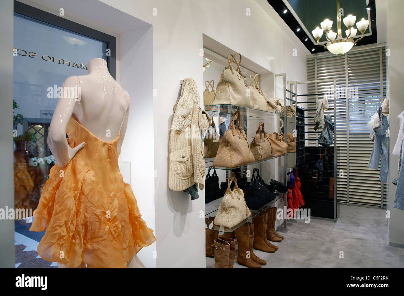 Fashion shoes and clothing store in Italy Stock Photo - Alamy