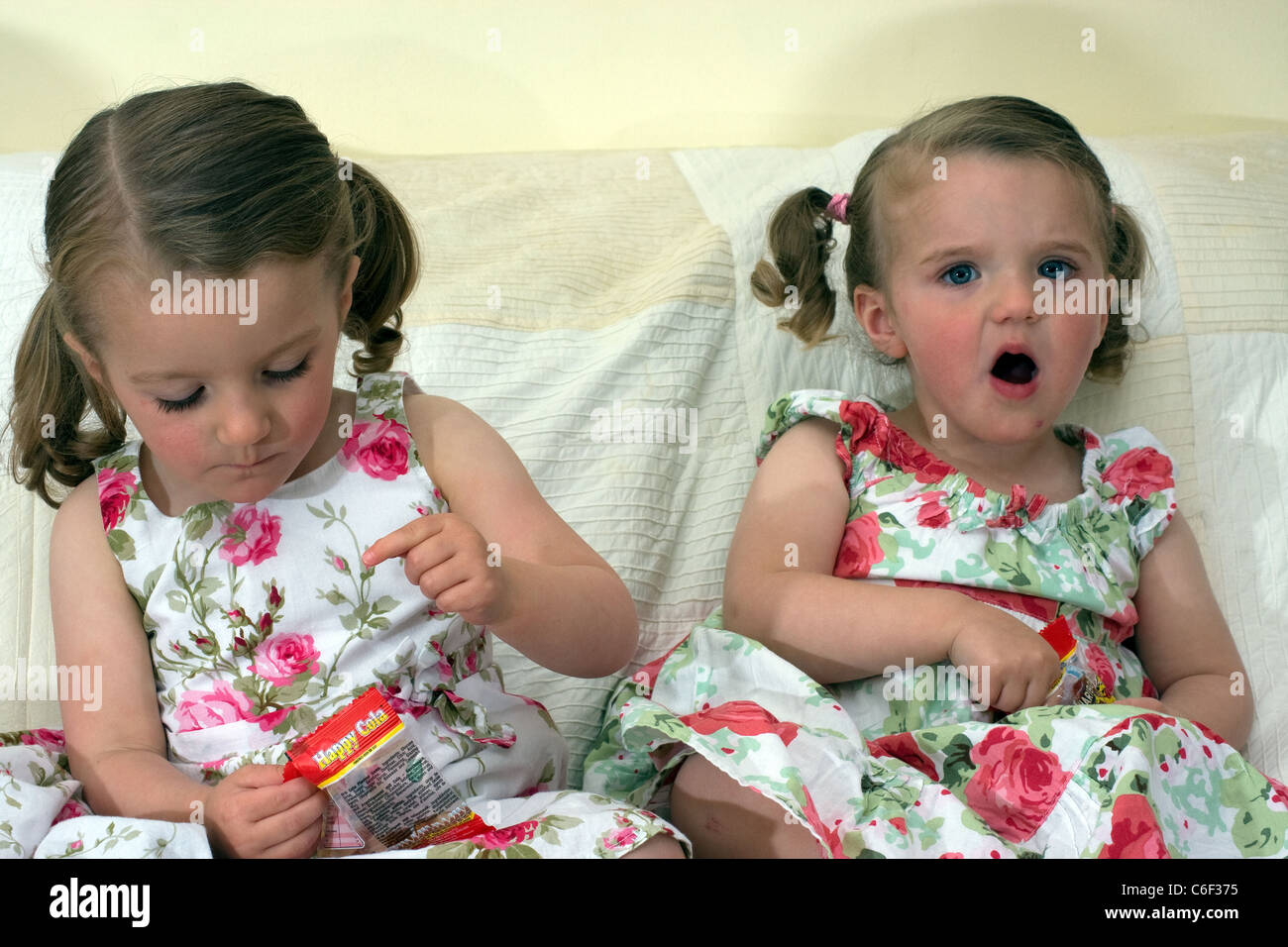 young toddlers girl smile smiling sisters happy Stock Photo - Alamy