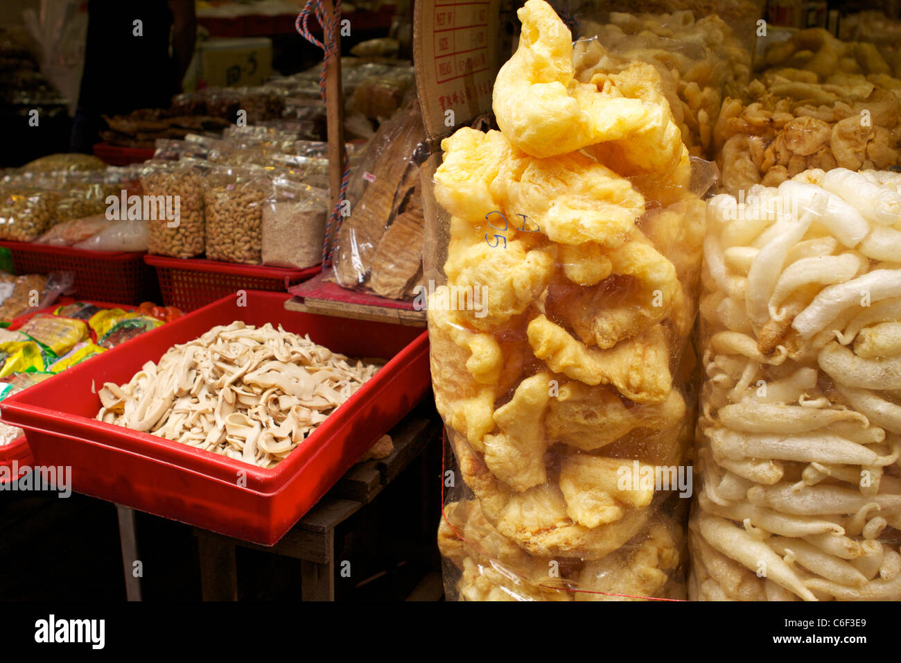 Chinatown food market with bags of the local delicacy of deep fried ...