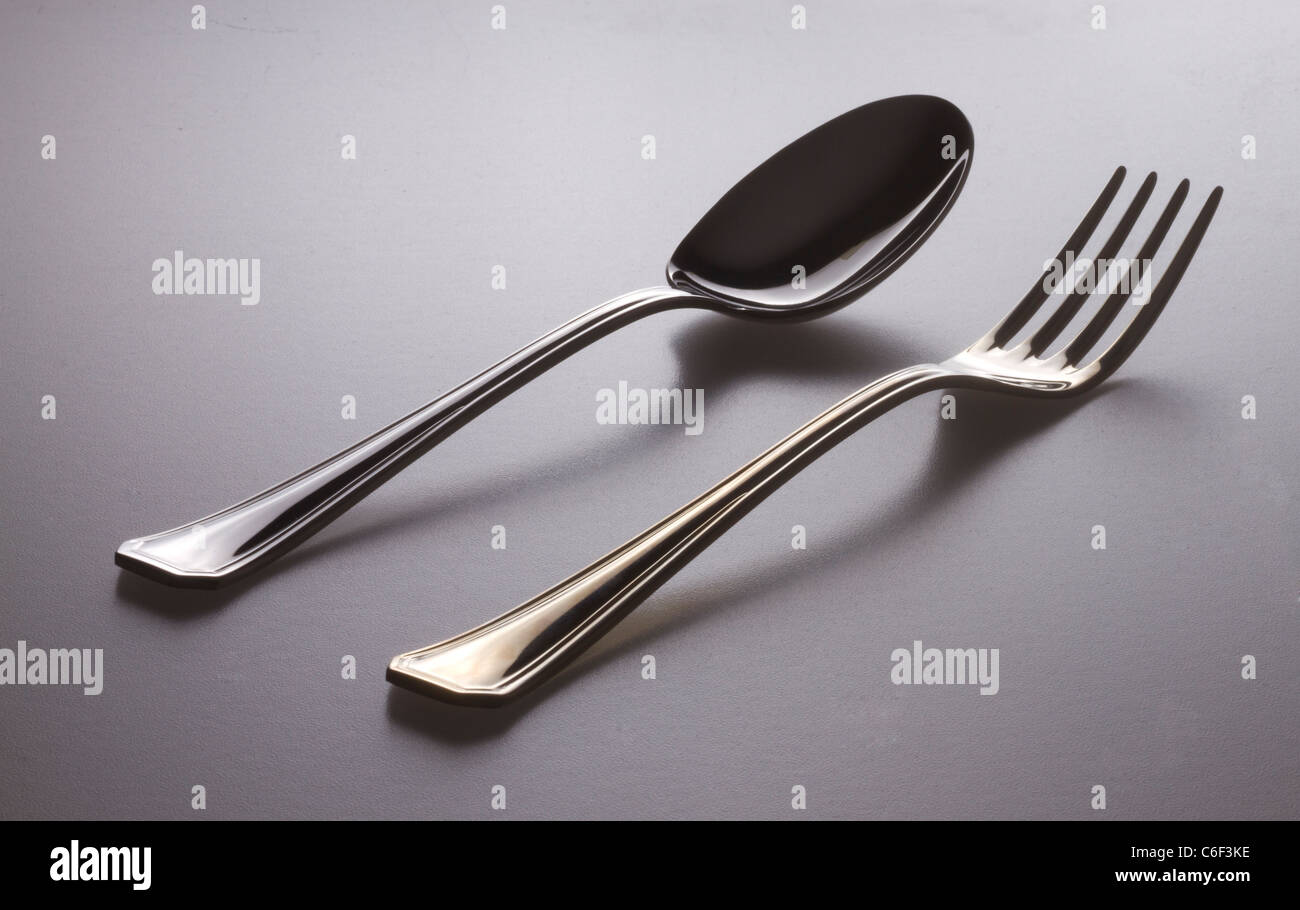 spoon and fork in white background Stock Photo - Alamy