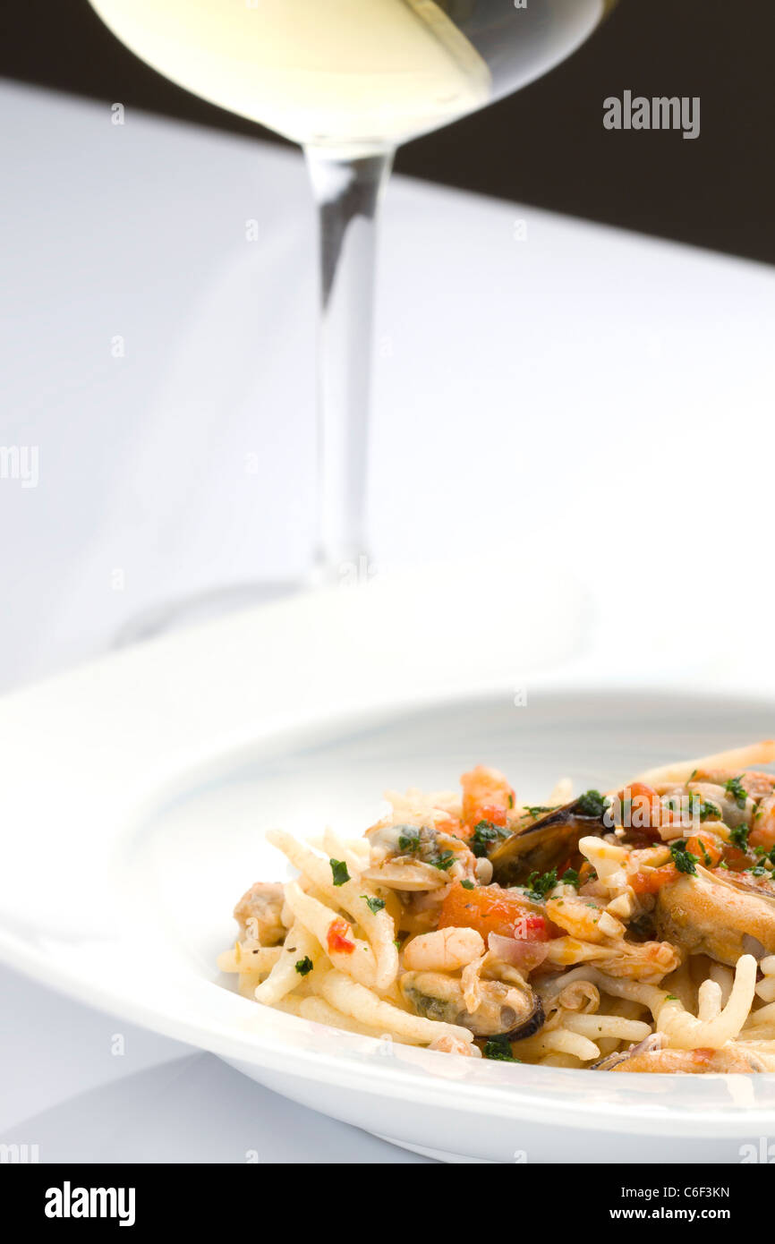 pasta dish with fish dressing Stock Photo - Alamy