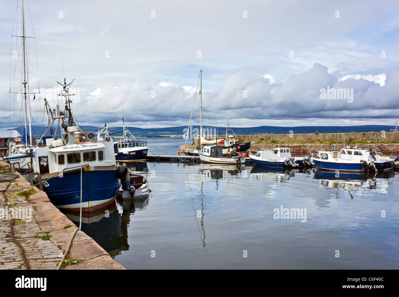 Cromarty harbour in the Black Isle of Scotland with fishing and ...