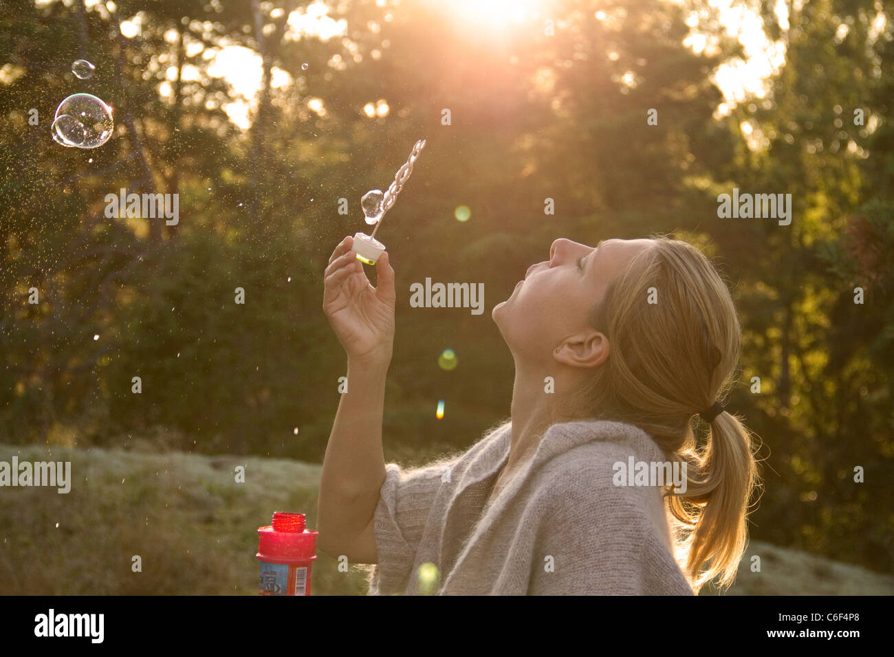 1970s model blowing hi-res stock photography and images - Alamy