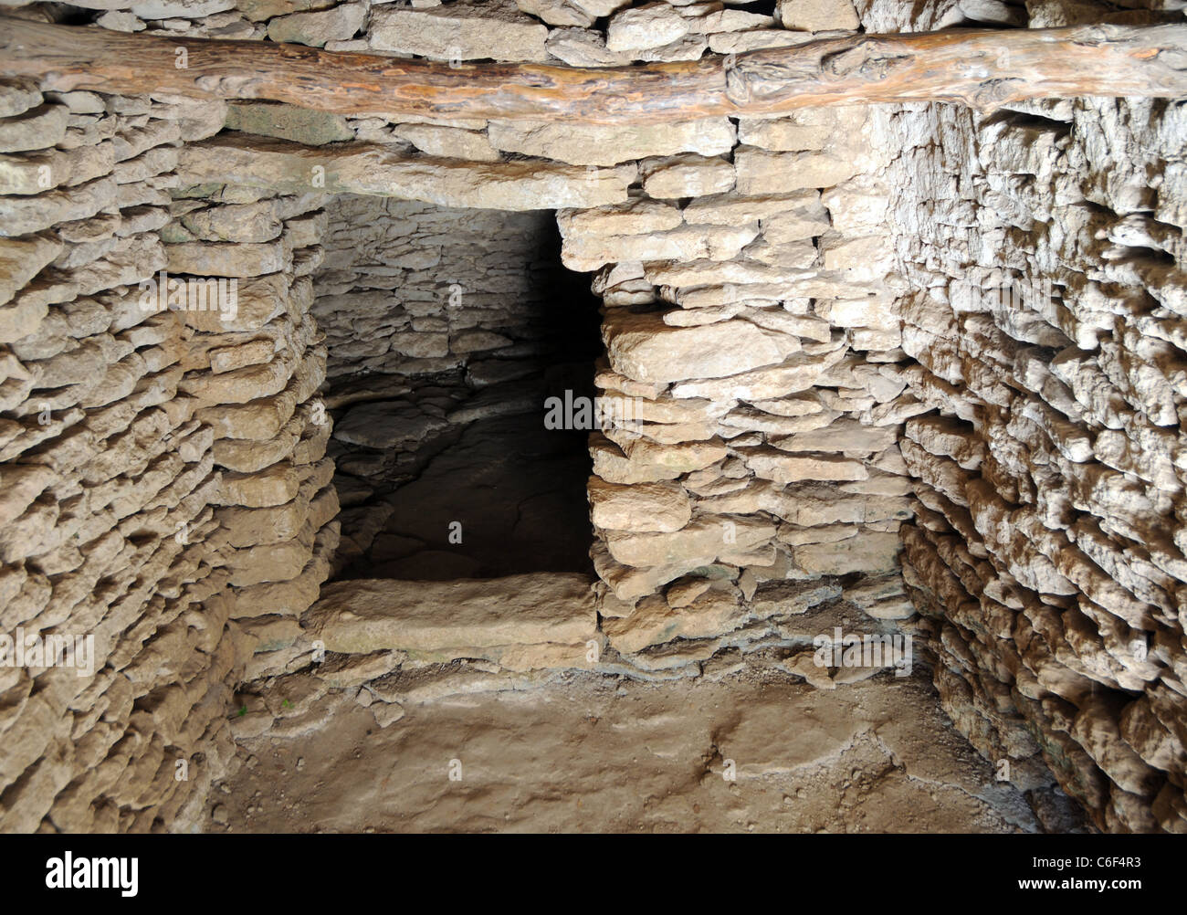 Interior of ancient hut made from stones in The Bories Village, near ...