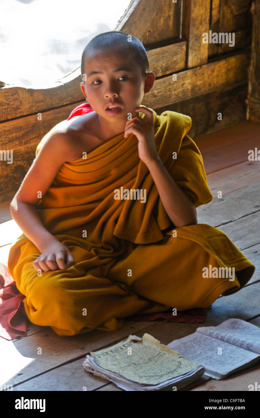 Novice monk studying at Buddhist monastery, Myanmar (Burma Stock Photo ...