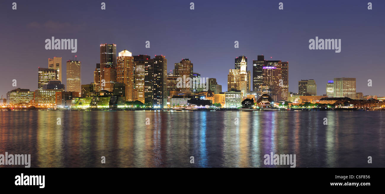 Boston downtown skyline panorama with skyscrapers over water with ...