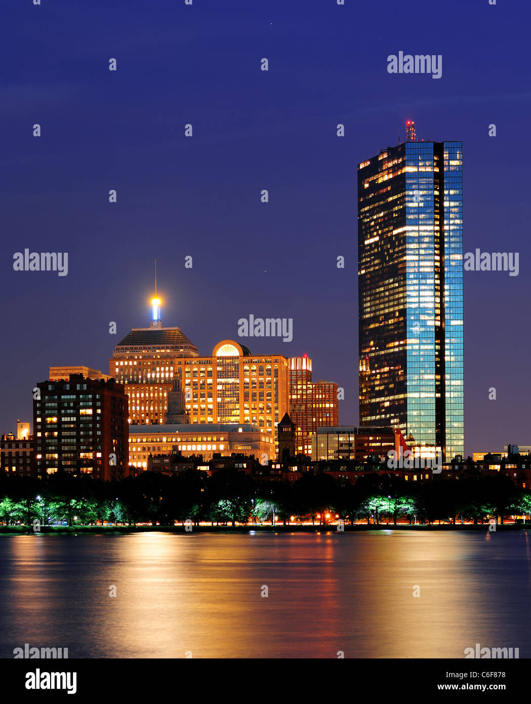 Boston Charles River at dusk with urban city skyline and light ...