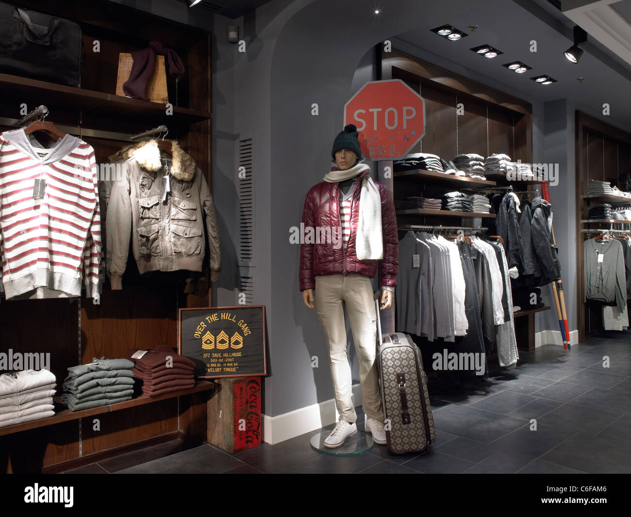 interior of a contemporary store in Italy selling clothing clothes ...