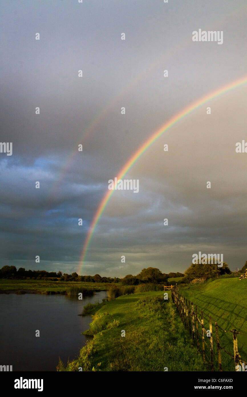 Golden light double rainbow wales hi-res stock photography and images ...