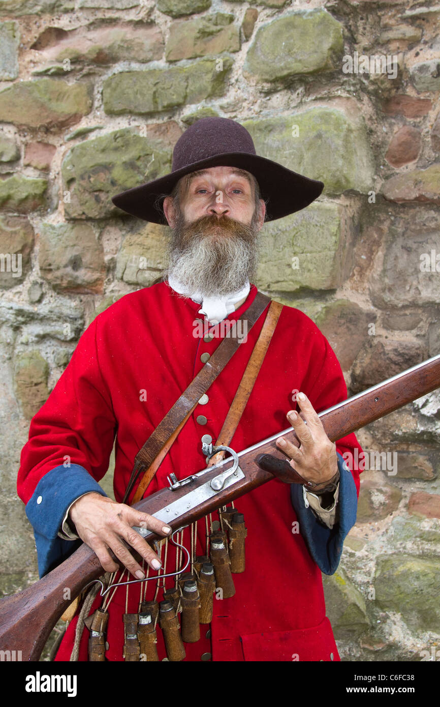 Musketman or Musketeer Fusilier holding 17th Century firearms, living ...
