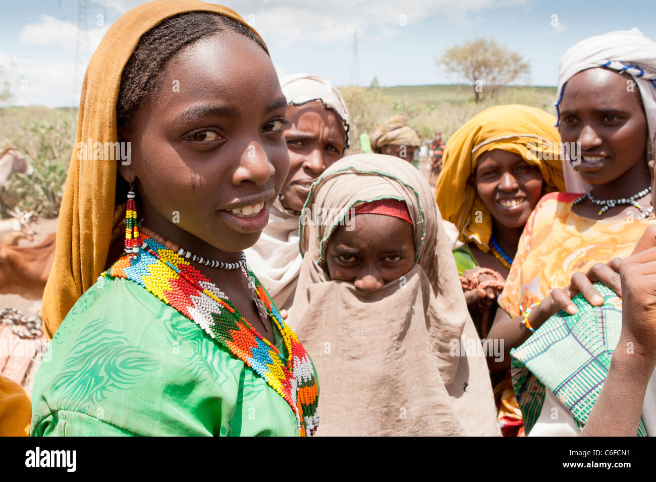 Traditional Oromo tribespeople at a watering-hole in the Chercher ...