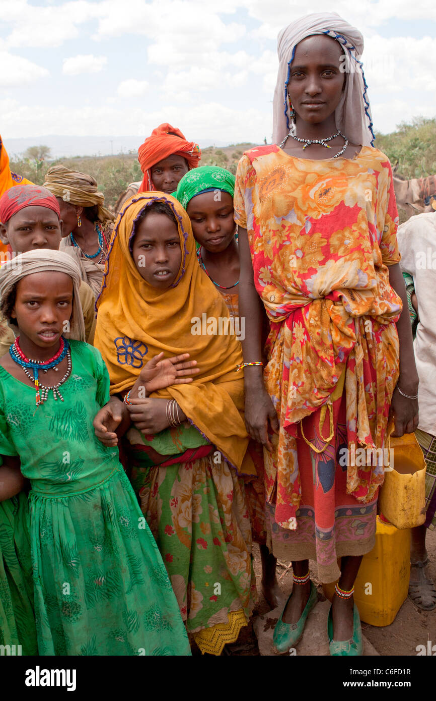 Oromo tribespeople gather at a well to collect water in the Chercher ...