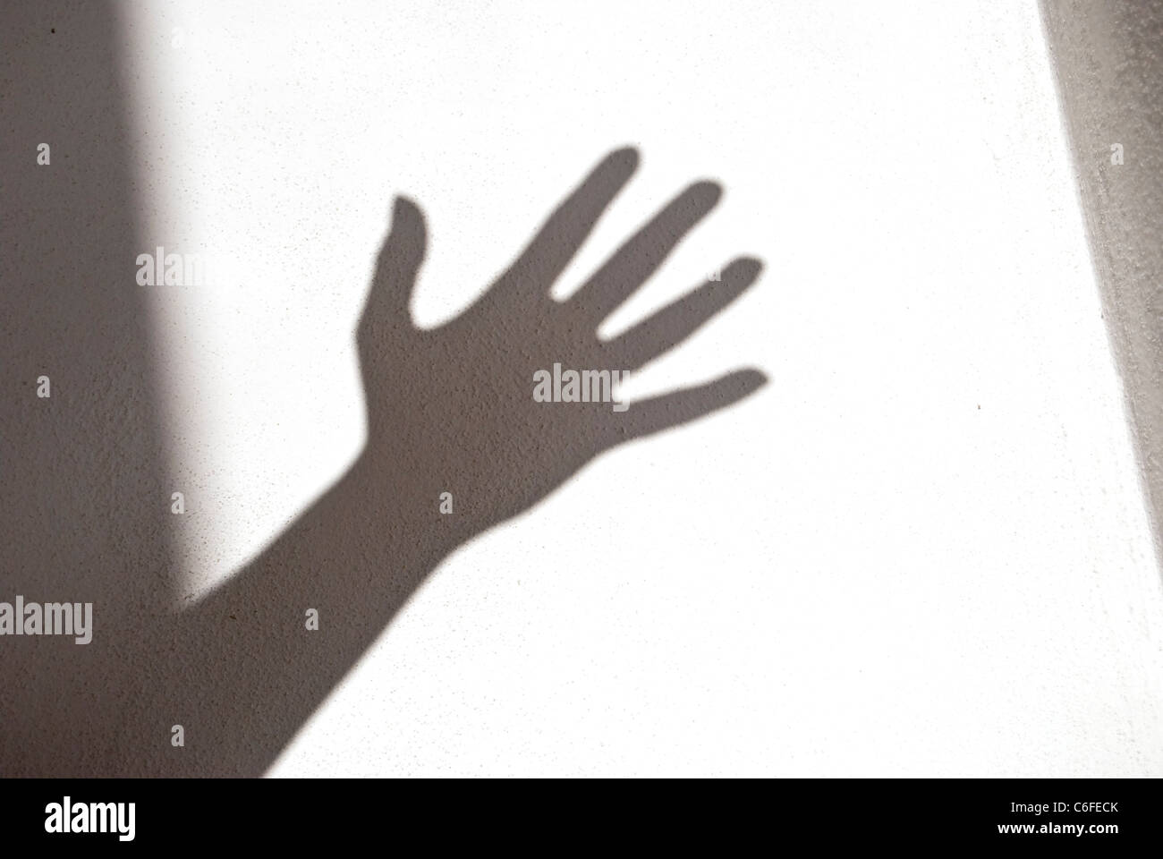 Shadow of hand Stock Photo - Alamy