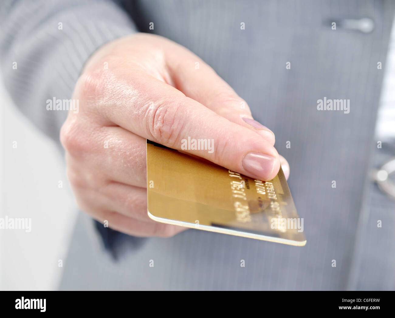 Hand with credit card Stock Photo - Alamy