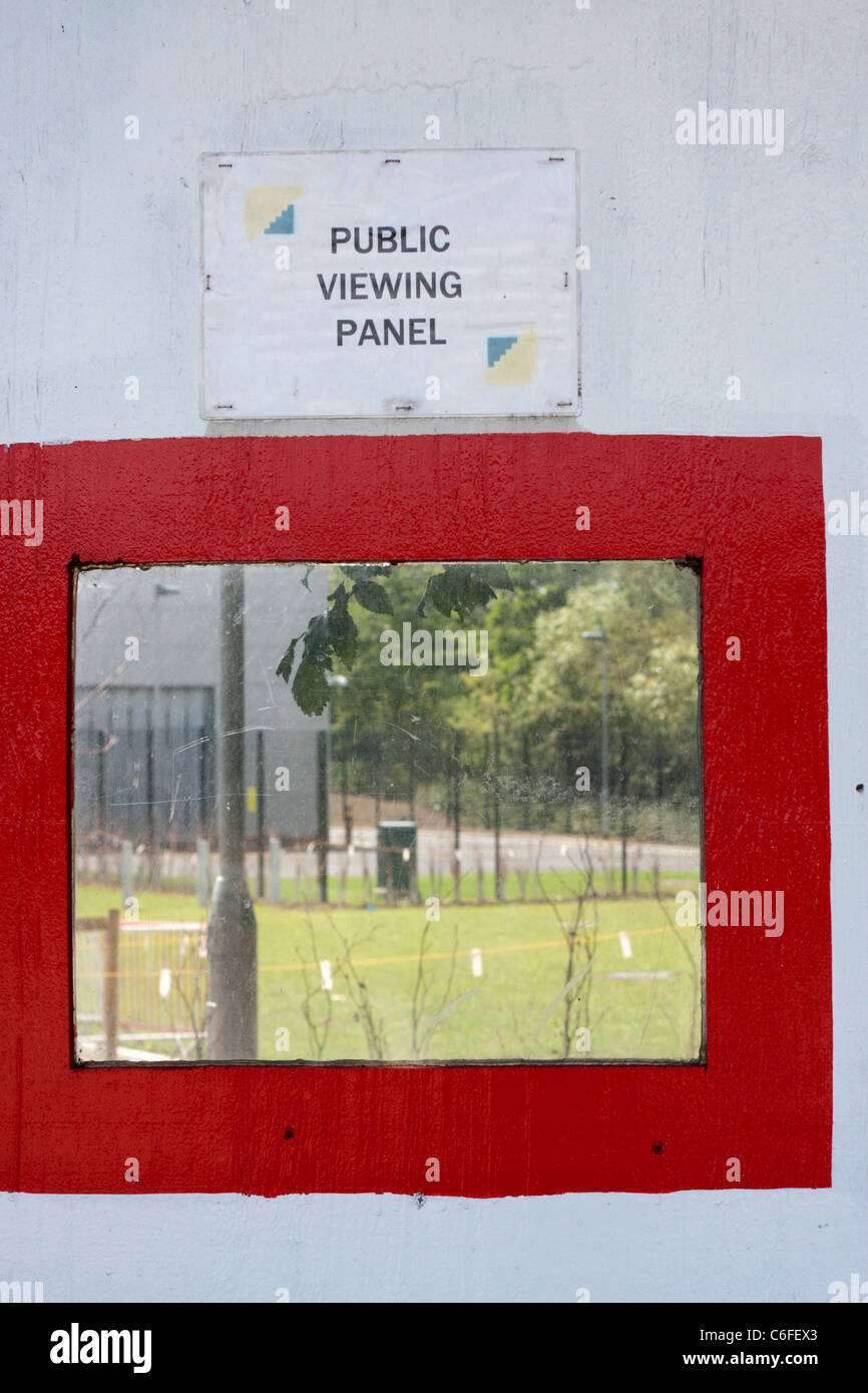 Viewing window at a construction site in UK Stock Photo - Alamy