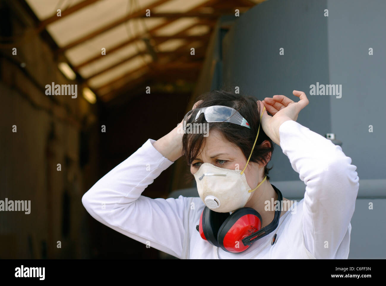Wearing dust mask on face hi-res stock photography and images - Alamy