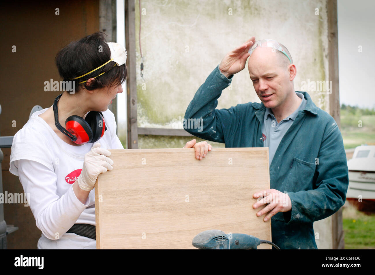 Workman sanding boat hi-res stock photography and images - Alamy
